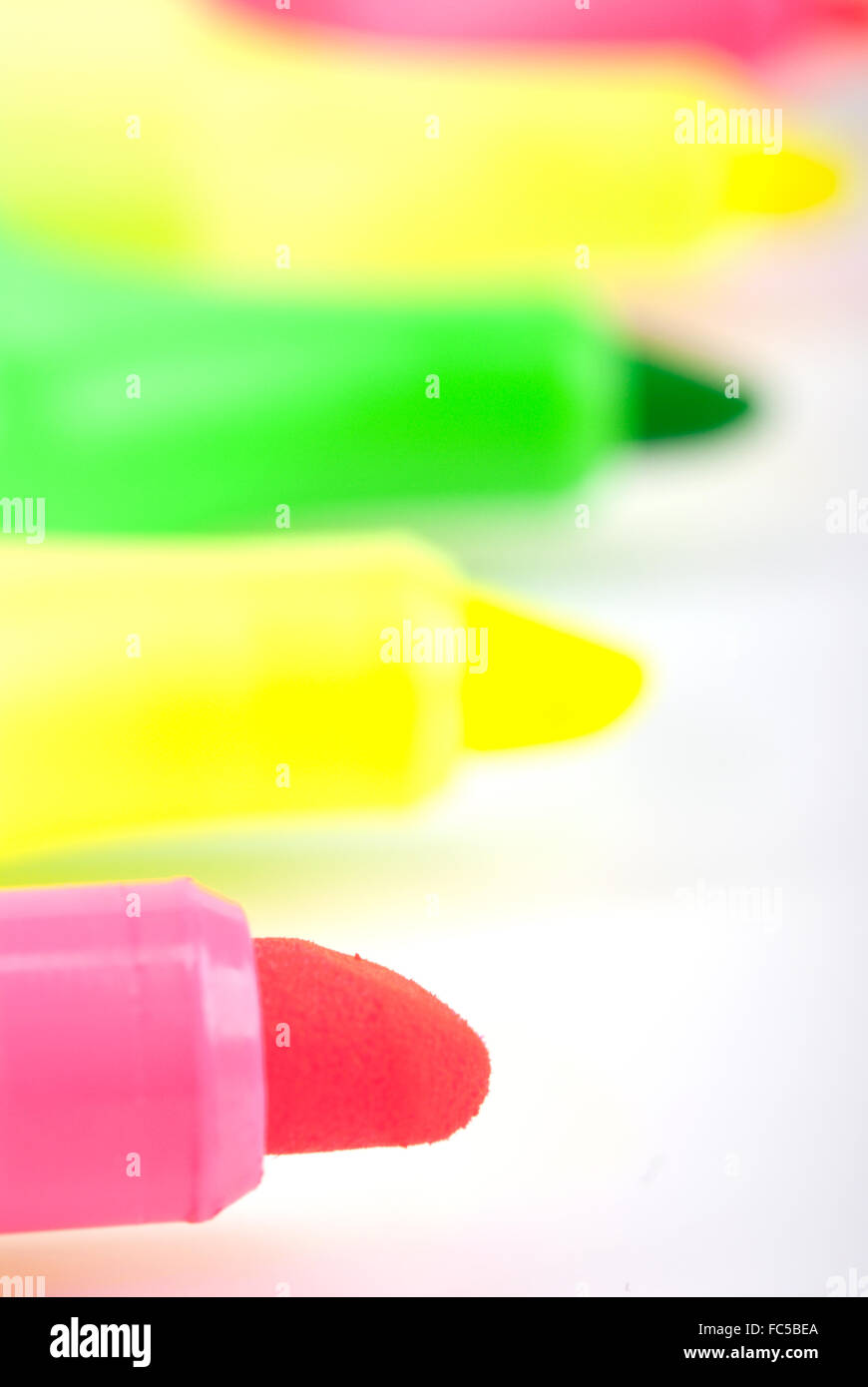 Small group of colour markers close up Stock Photo - Alamy
