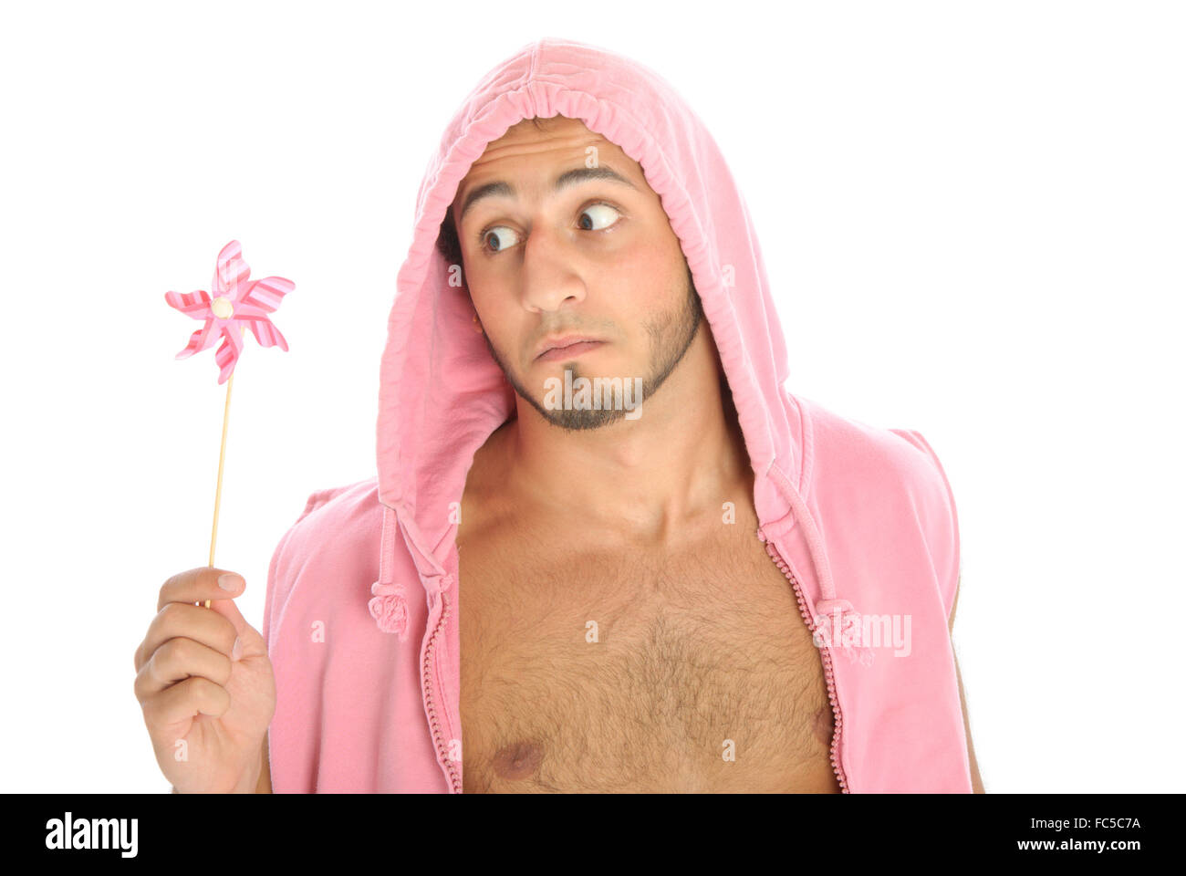 Unshaven young man with weather vane Stock Photo - Alamy
