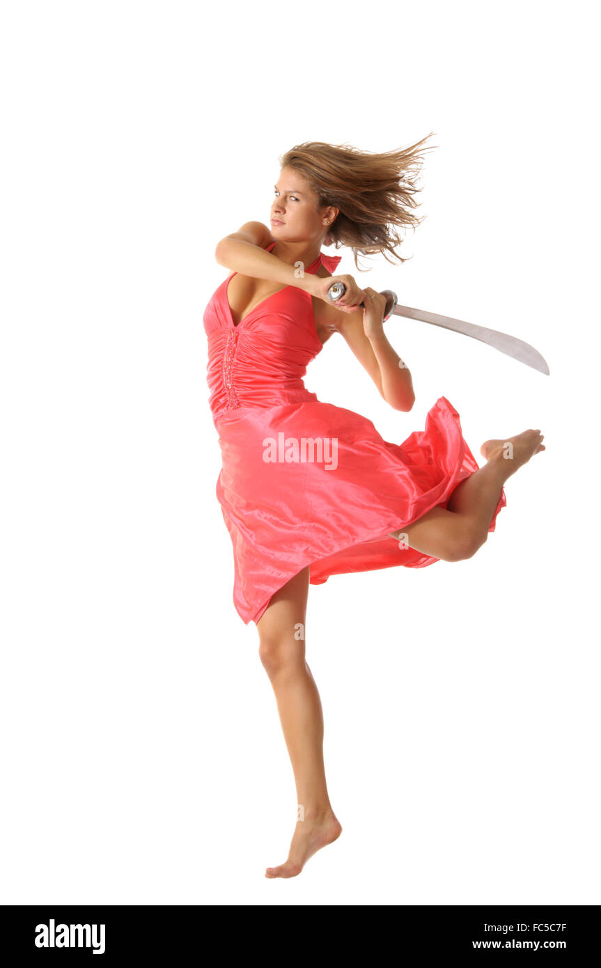 Young woman in jump with sword Stock Photo - Alamy