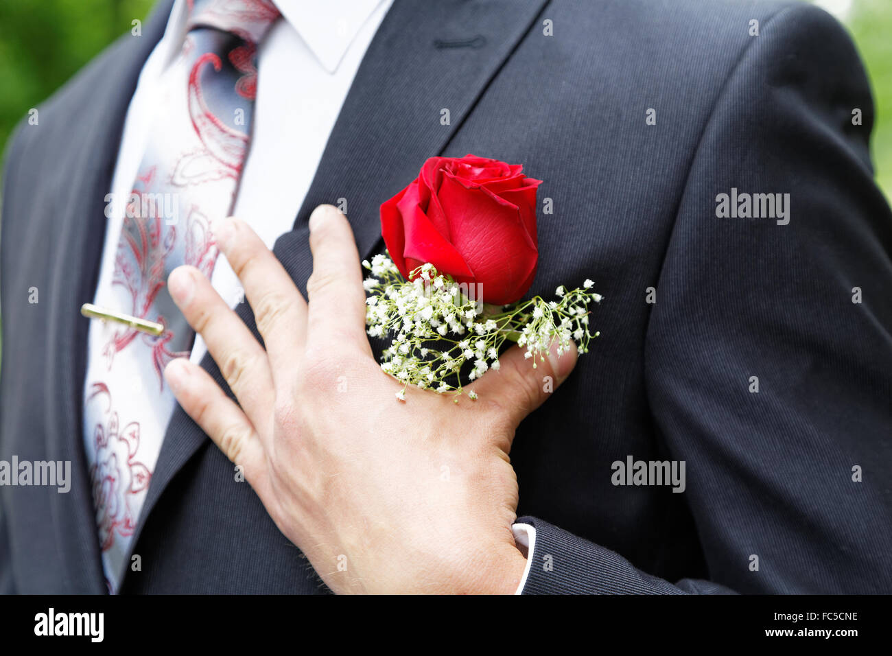 Red buttonhole hi-res stock photography and images - Alamy