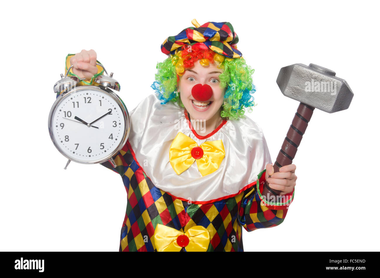 Clown with clock and hammer isolated on white Stock Photo - Alamy