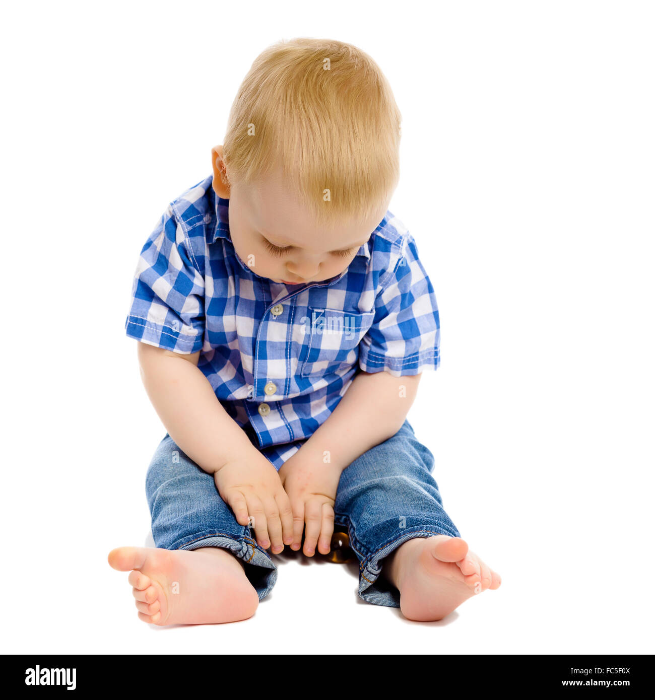Boy in blue jeans hi-res stock photography and images - Alamy
