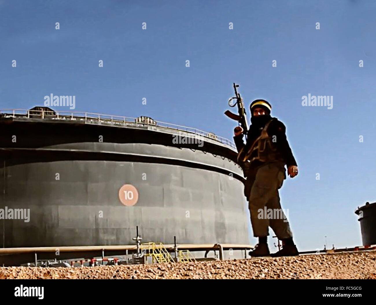 Islamic State of Iraq and the Levant propaganda photo showing masked ...