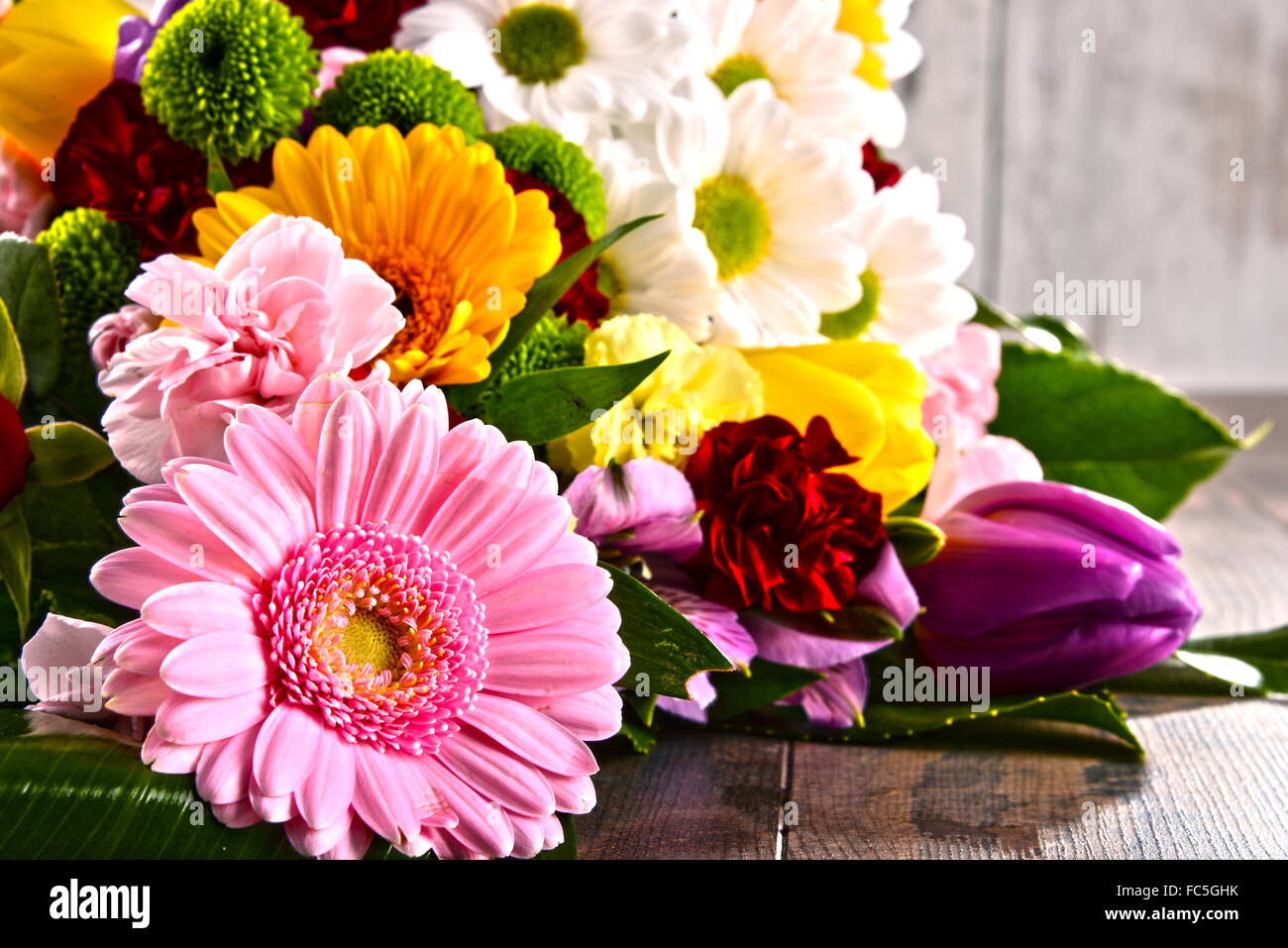 Composition with bouquet of flowers Stock Photo - Alamy