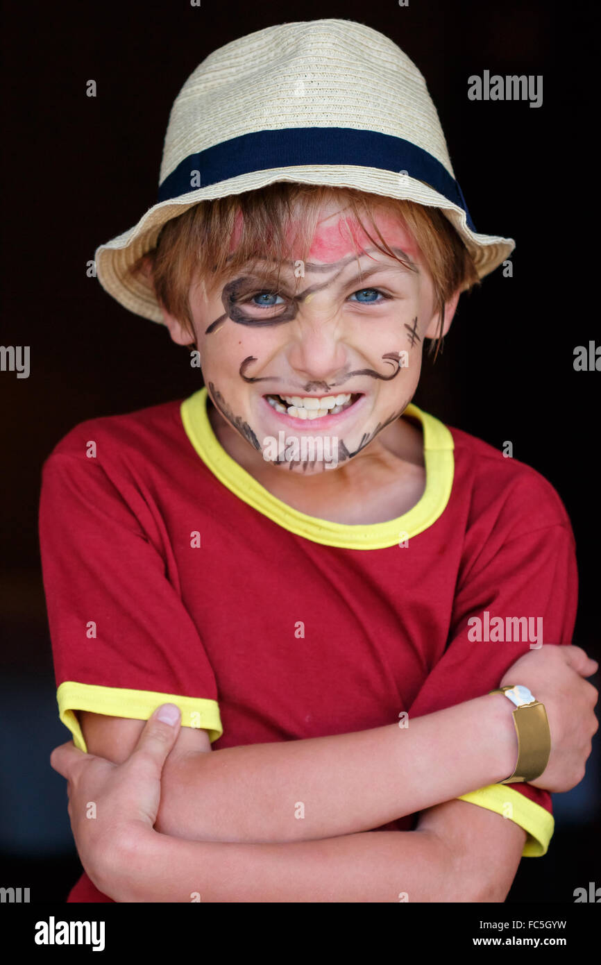 Close-up of grumpy pirate boy Stock Photo - Alamy