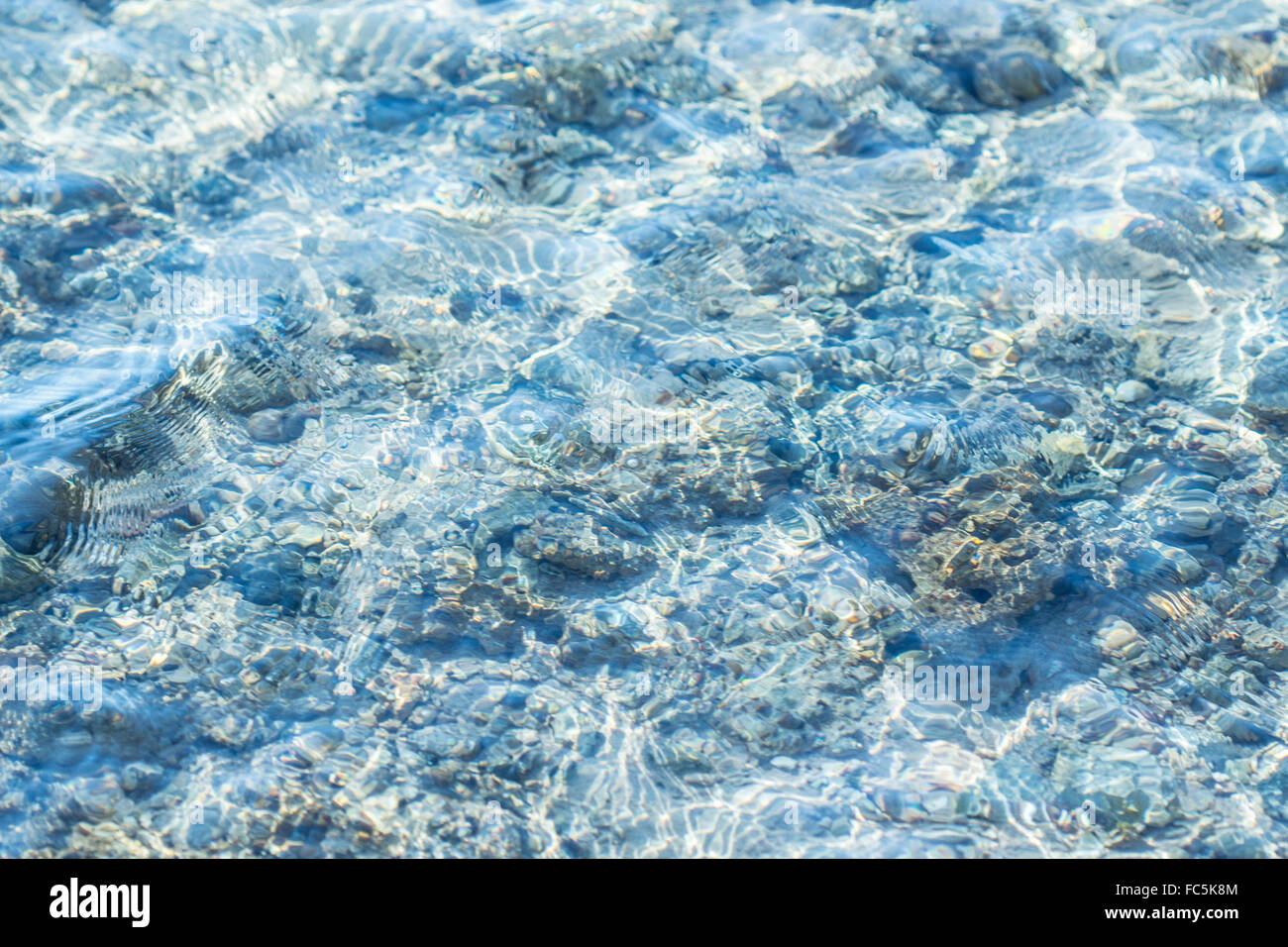 Transparent water of sea beach Stock Photo - Alamy