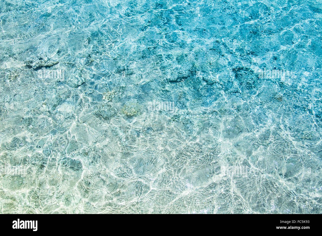 Transparent water of sea beach Stock Photo - Alamy
