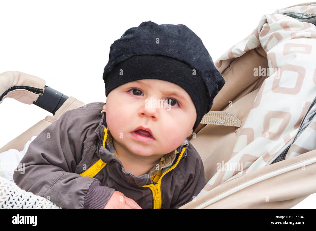 Baby with orange cap Stock Photo - Alamy