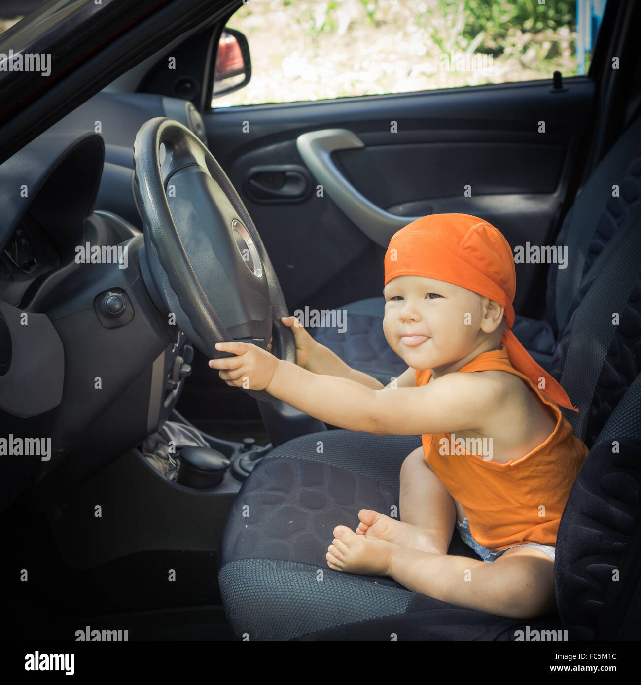 Baby in the car hi-res stock photography and images - Alamy