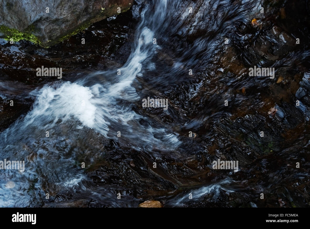 Mountain stream among rocky stones hi-res stock photography and images ...