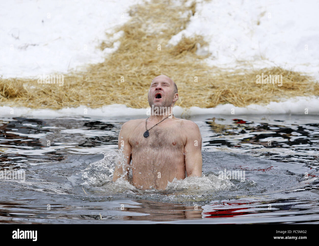 Kiev, Ukraine. 19th Jan, 2016. An Ukrainian Orthodox believer bathe in ...