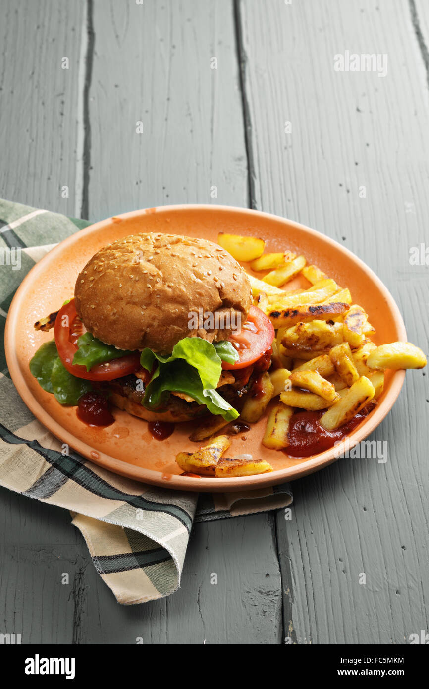 Burger and fries Stock Photo - Alamy