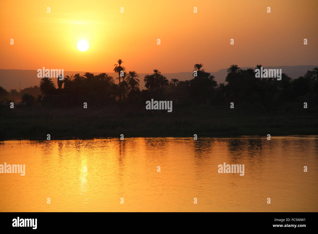 Sunset at the river Nile Stock Photo - Alamy