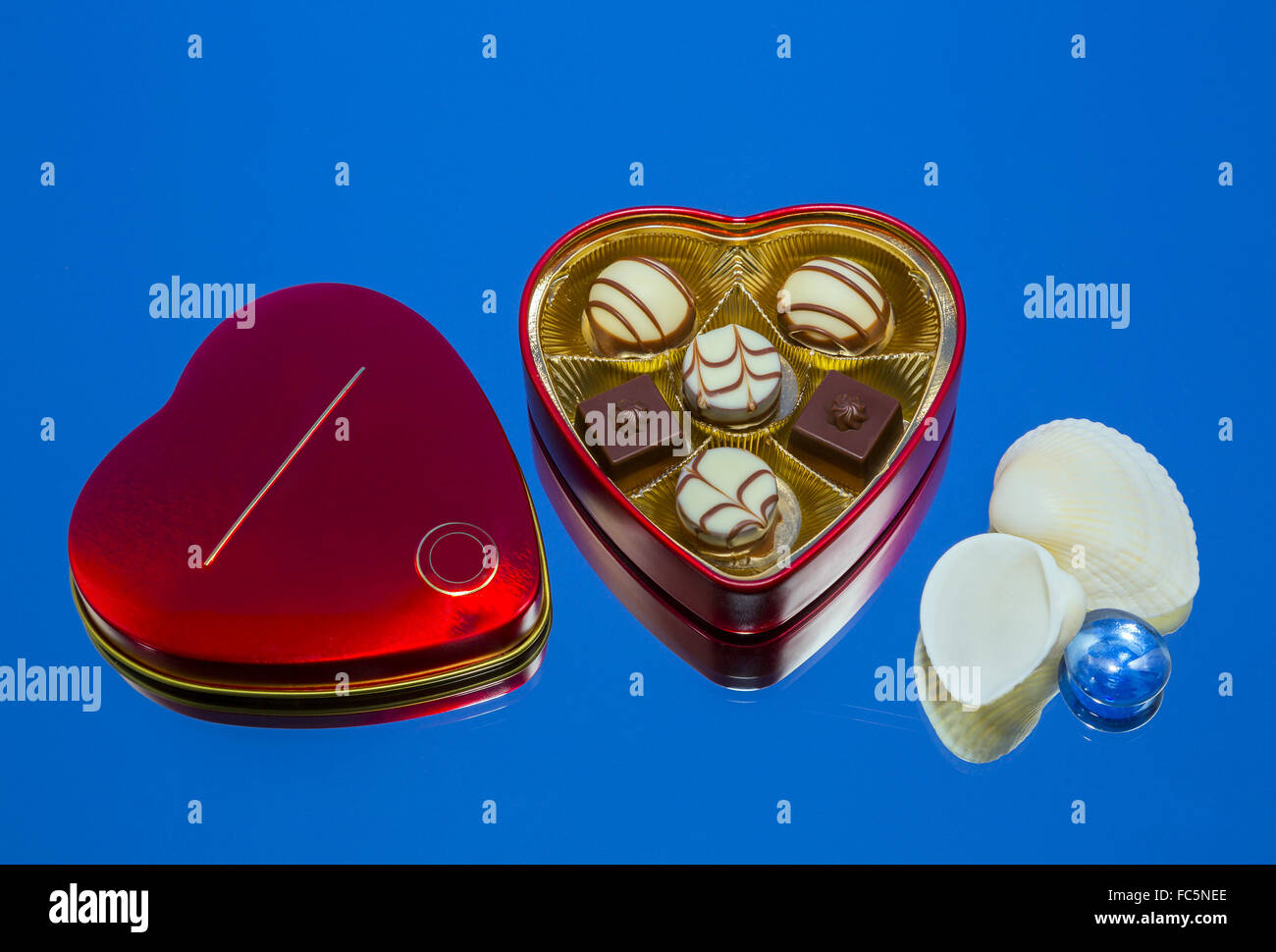 candy, metal box, sea shell Stock Photo - Alamy
