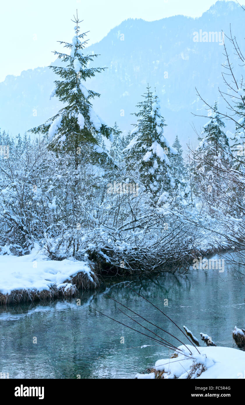 Small winter stream with snowy trees Stock Photo - Alamy
