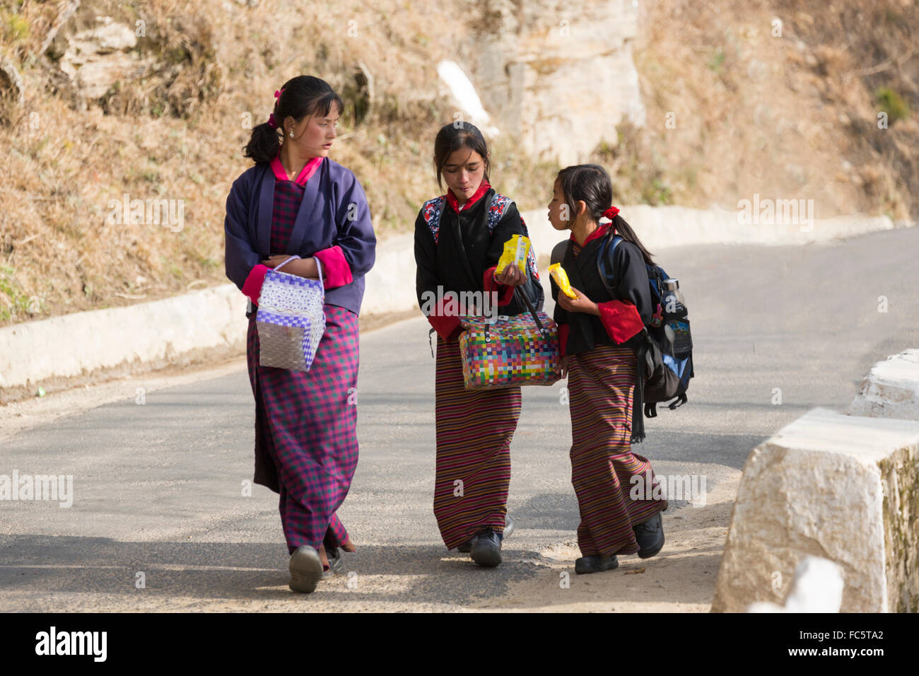 Schoolchildren in traditional costume, Jarkar, Bumthang, Central Bhutan ...