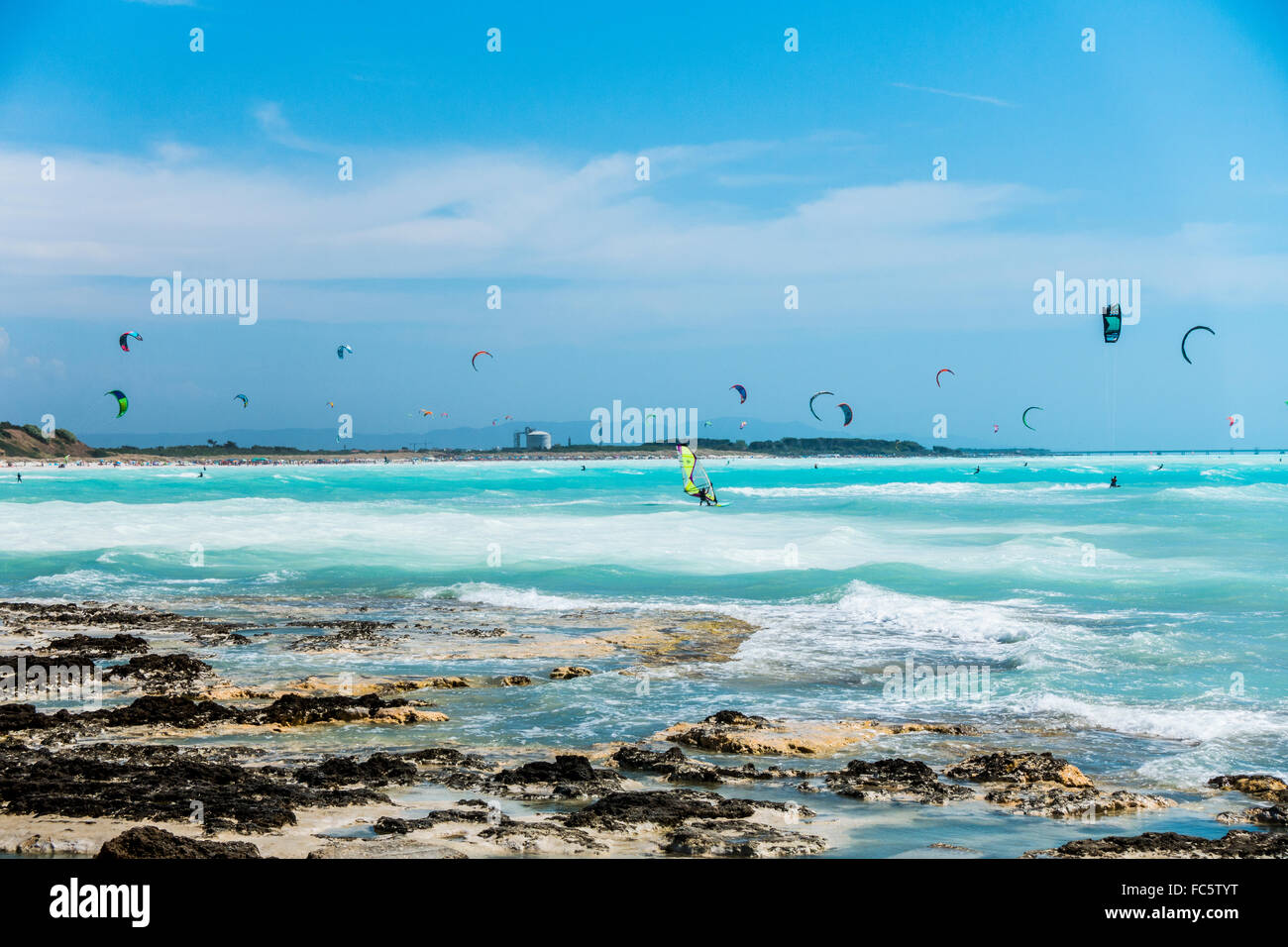 Kitesurfers on the tropical beach in Rosignano Solvay in Tuscany, Italy ...