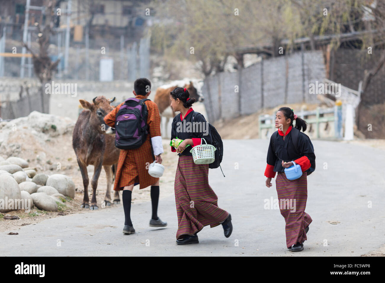 Schoolchildren in traditional costume, Jarkar, Bumthang, Central Bhutan ...