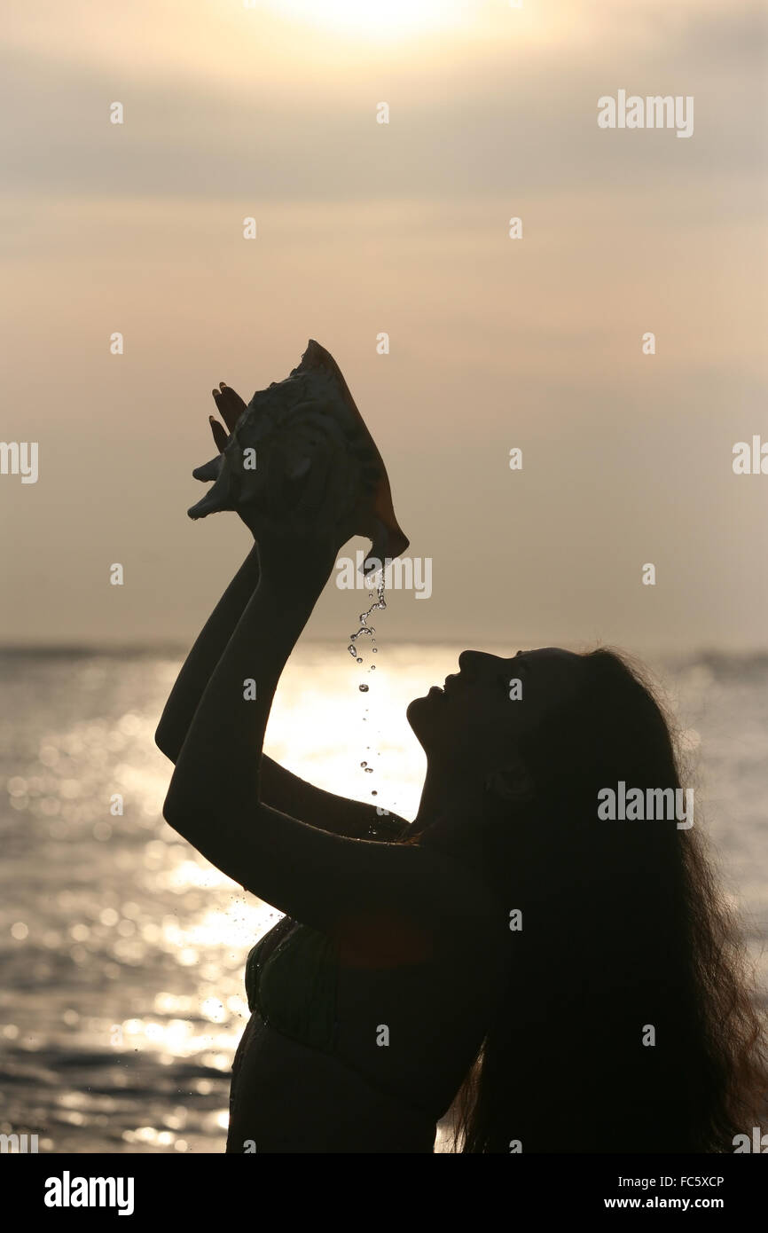 Ear shell woman hi-res stock photography and images - Alamy