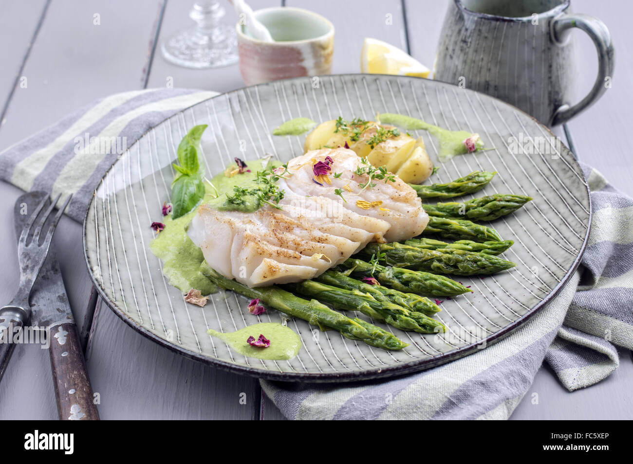 fish fillet with green asparagus Stock Photo - Alamy