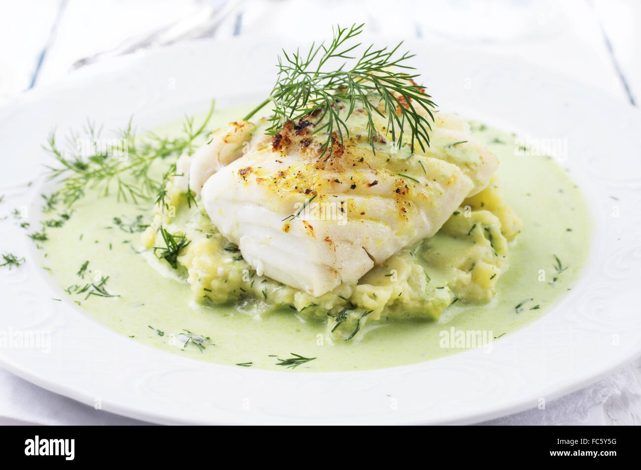 Cod filet in Basil Champagne Foam Stock Photo - Alamy