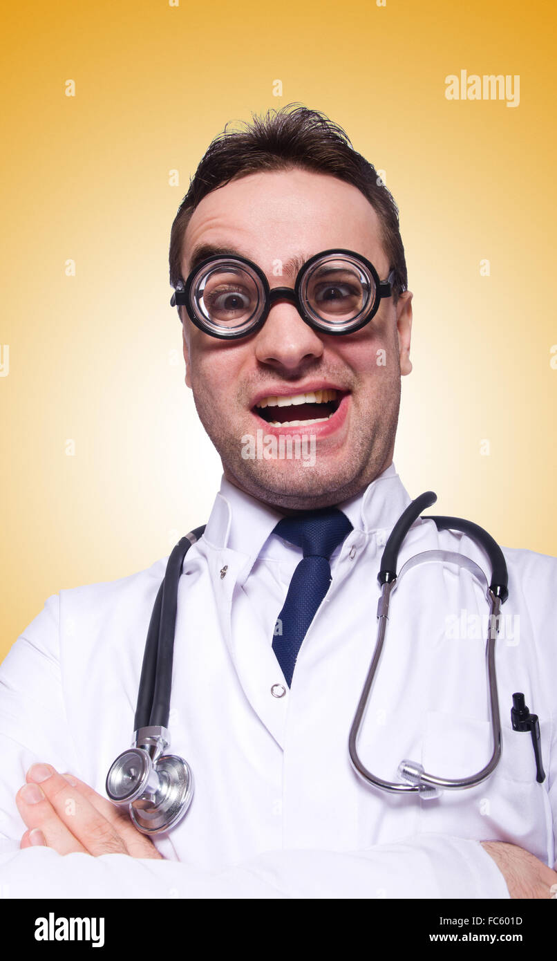 Funny doctor isolated on the white Stock Photo - Alamy