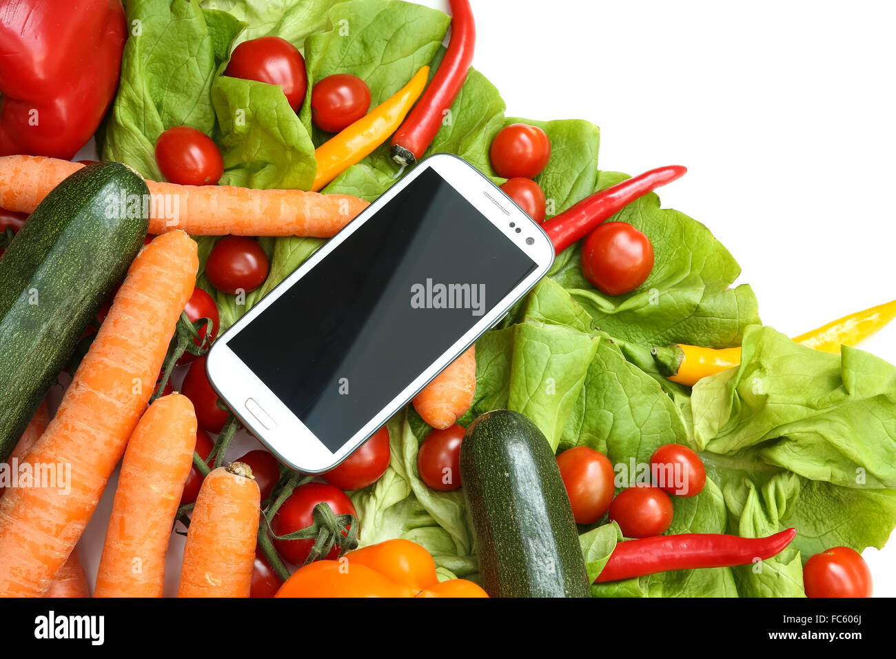 Vegetables and a Smartphone Stock Photo - Alamy