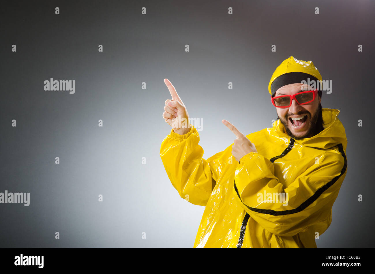 Funny man wearing yellow suit Stock Photo - Alamy