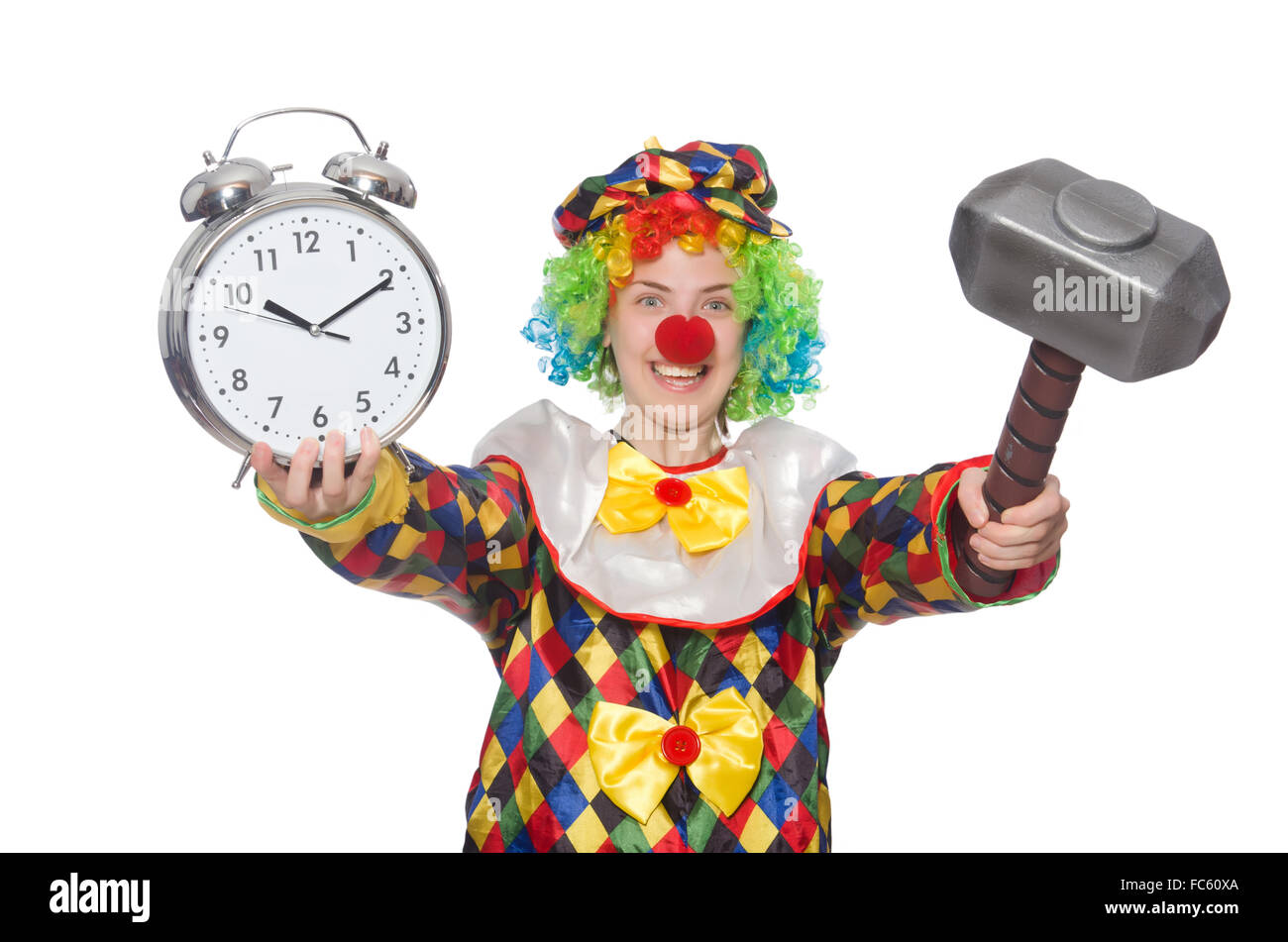 Clown with clock and hammer isolated on white Stock Photo - Alamy
