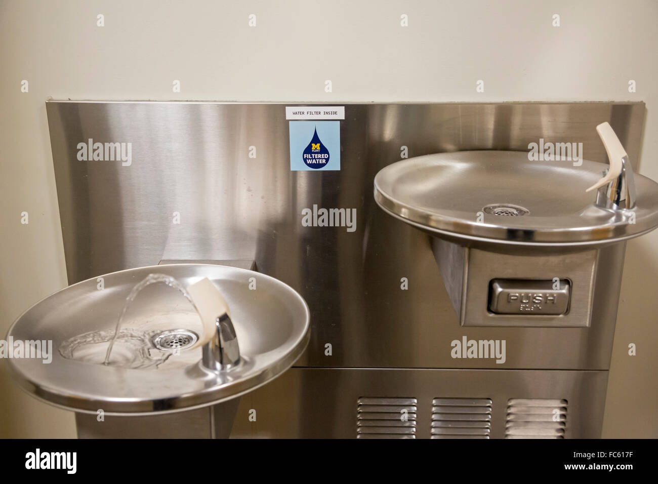 Flint, Michigan - A sign by water fountains at the University of ...