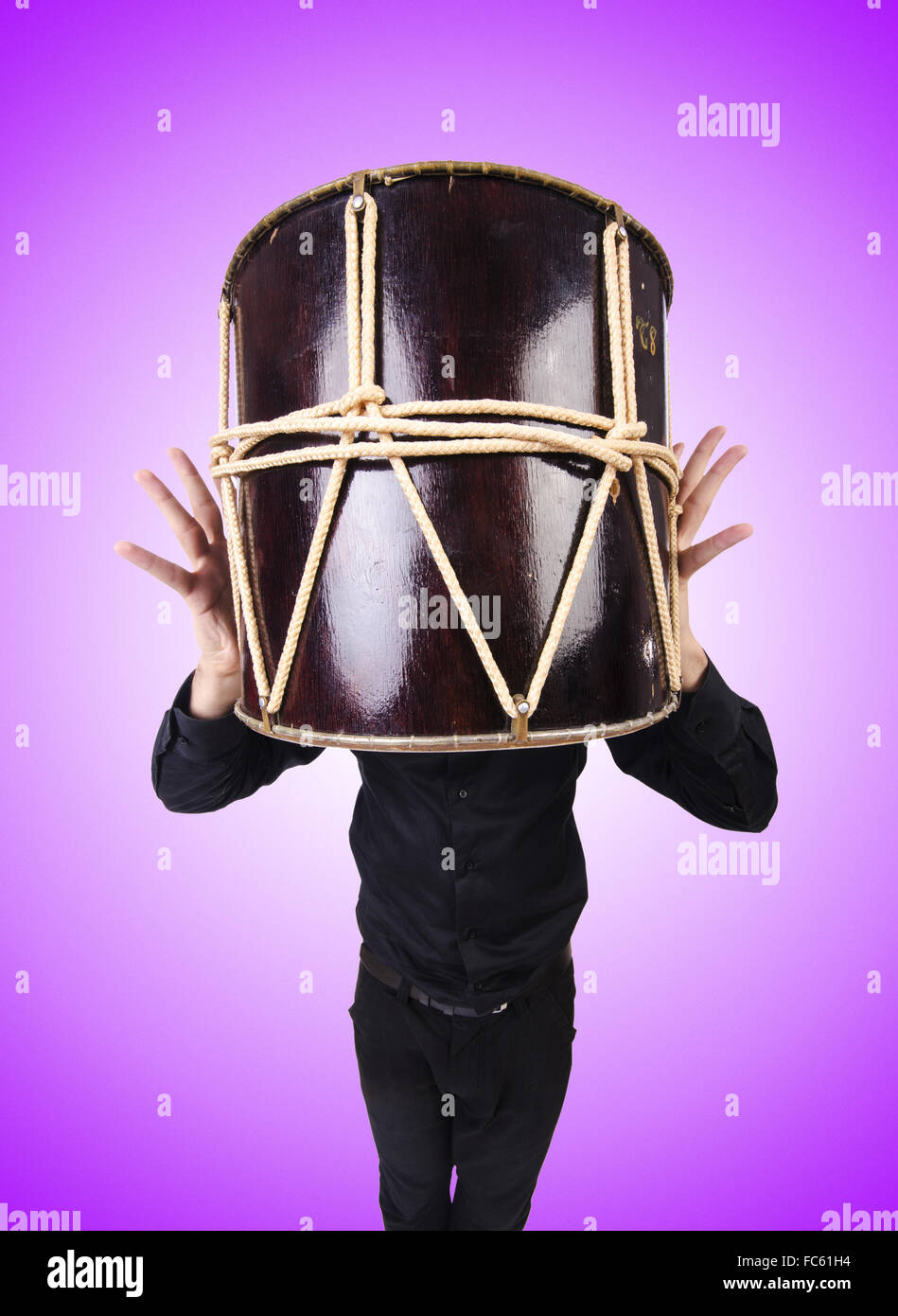 Funny man with drum on white Stock Photo - Alamy