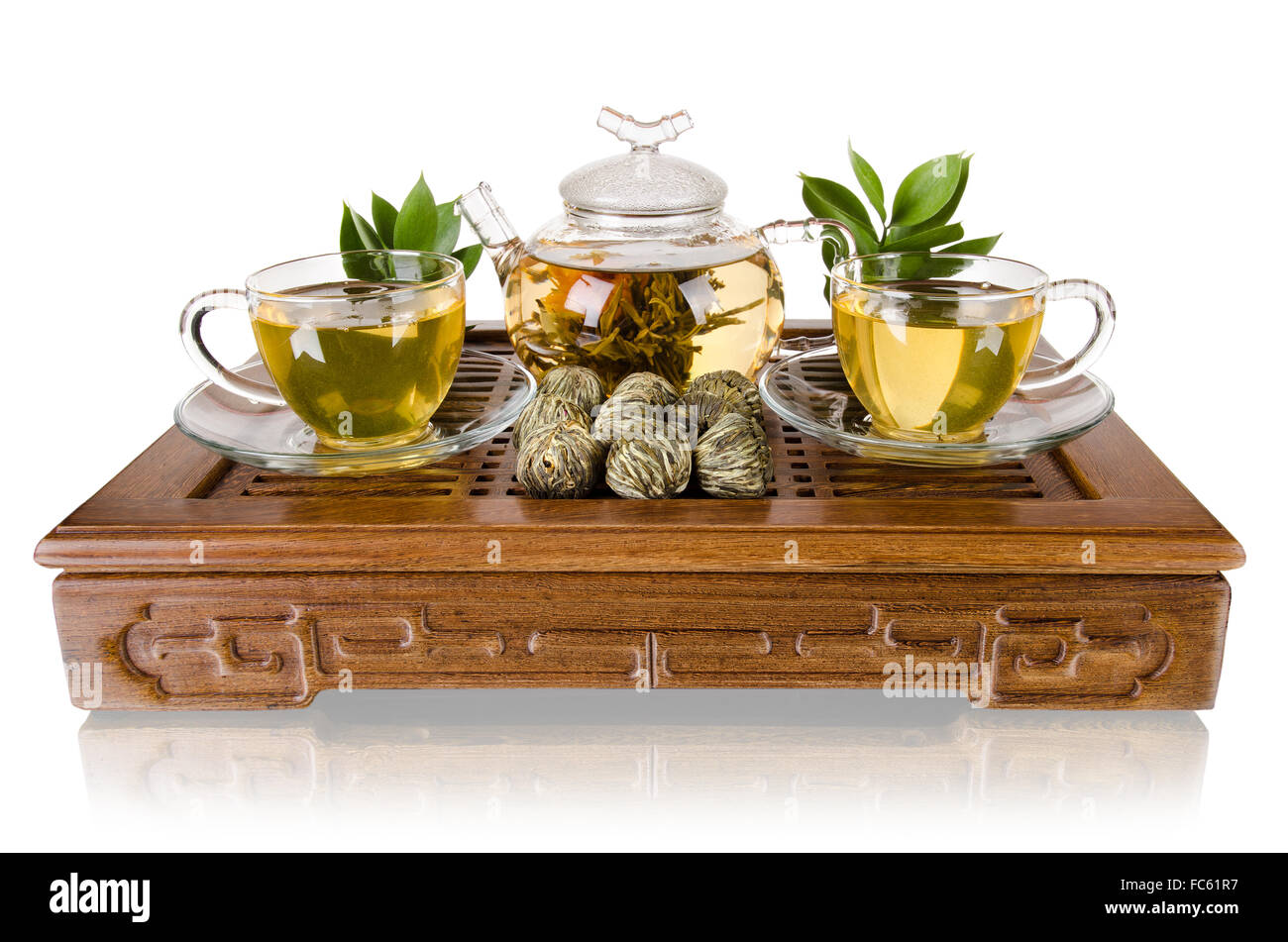 Teapot pouring out tea Cut Out Stock Images & Pictures - Alamy