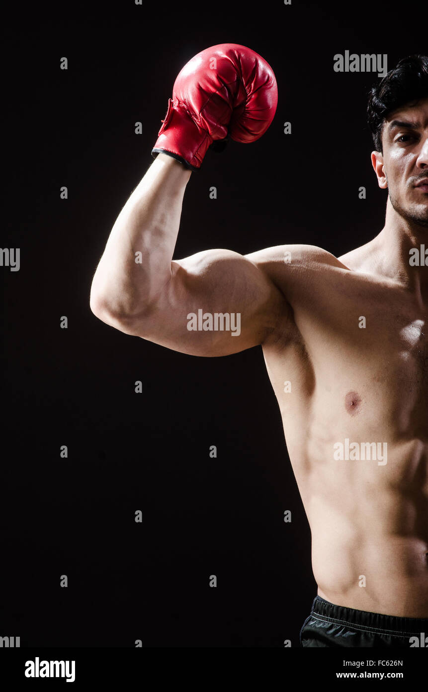 Muscular man in boxing concept Stock Photo - Alamy