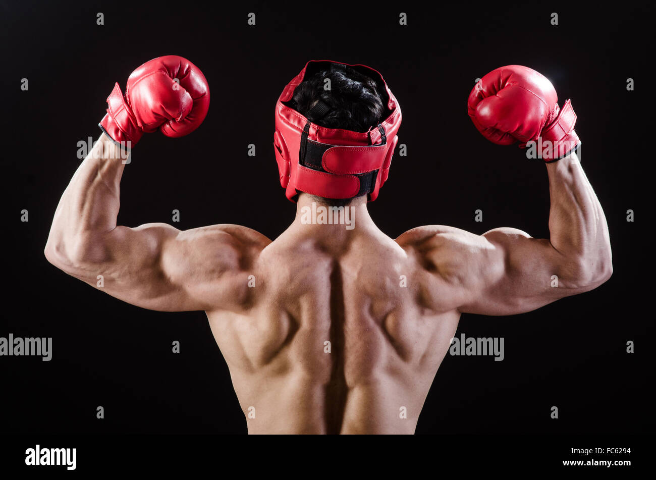 Muscular man in boxing concept Stock Photo - Alamy