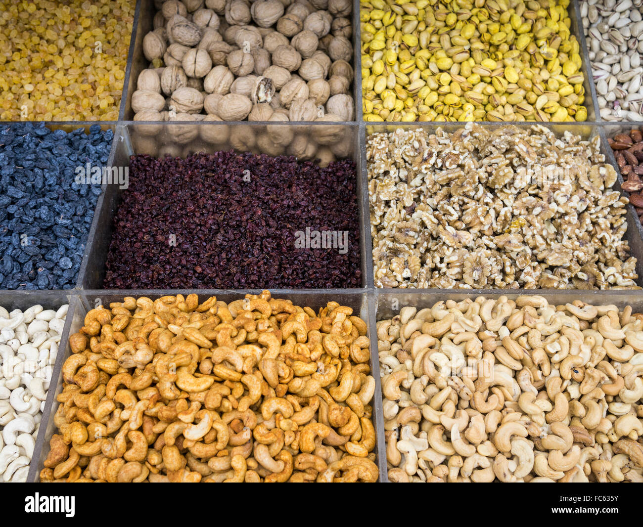 Dubai spice souk window display; herbs, dried fruits, spices, dried ...