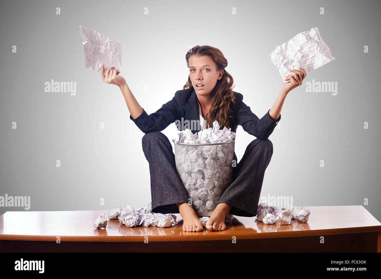 Woman throwing crumpled paper hi-res stock photography and images - Alamy
