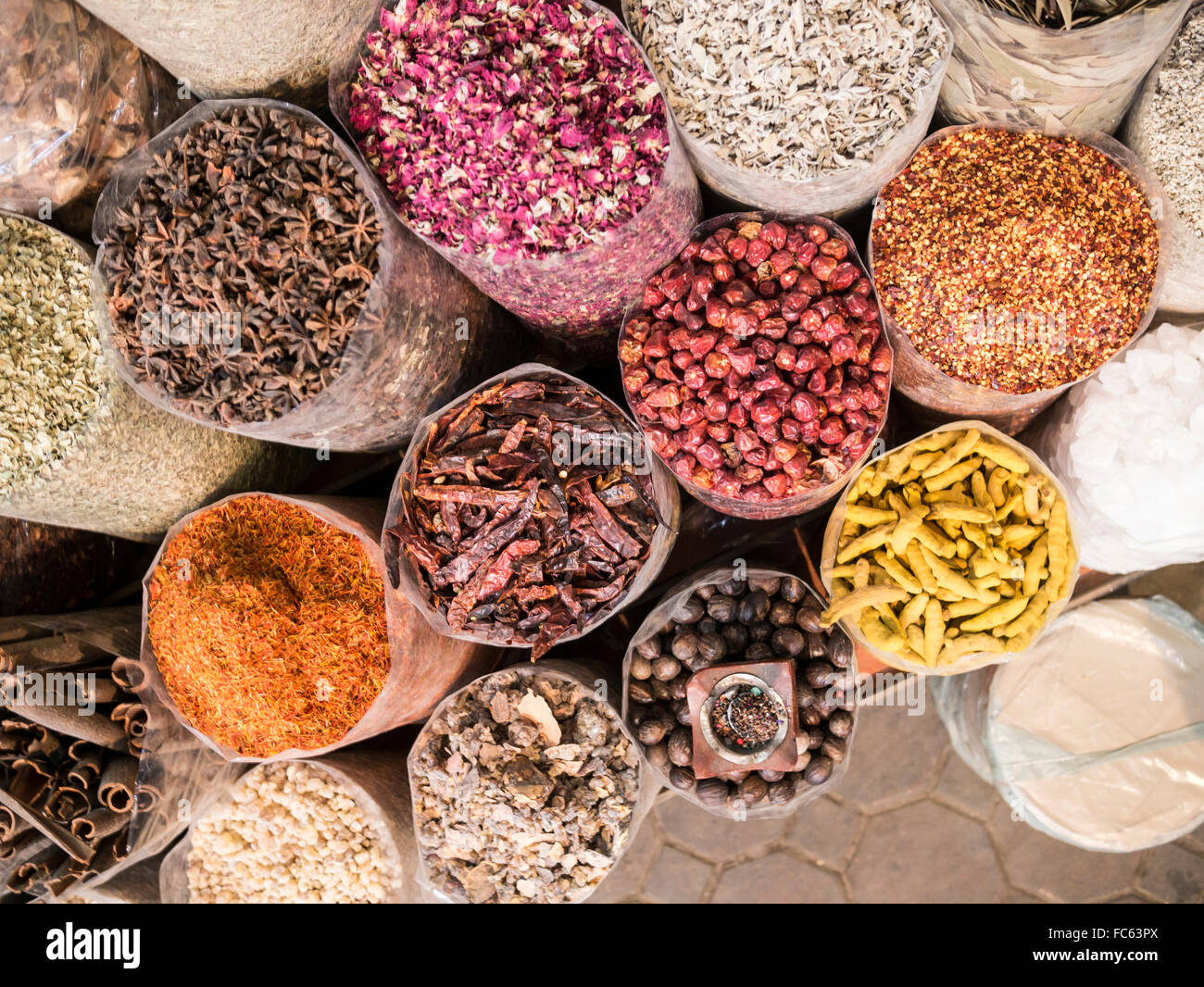 Dubai spice souk window display; herbs, dried fruits, spices, dried ...