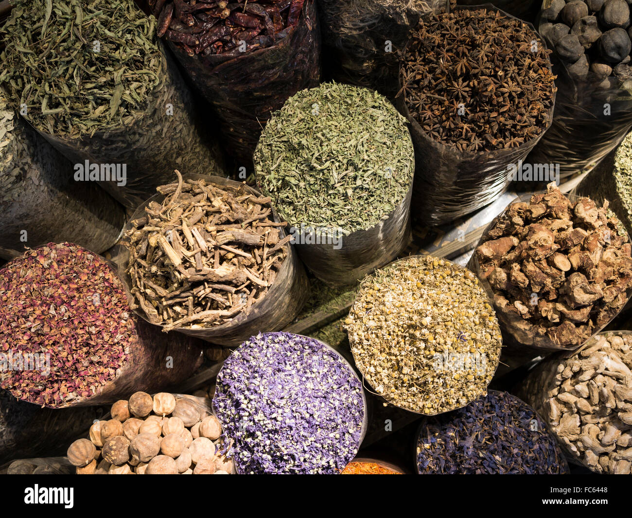Dubai spice souk window display; herbs, dried fruits, spices, dried ...