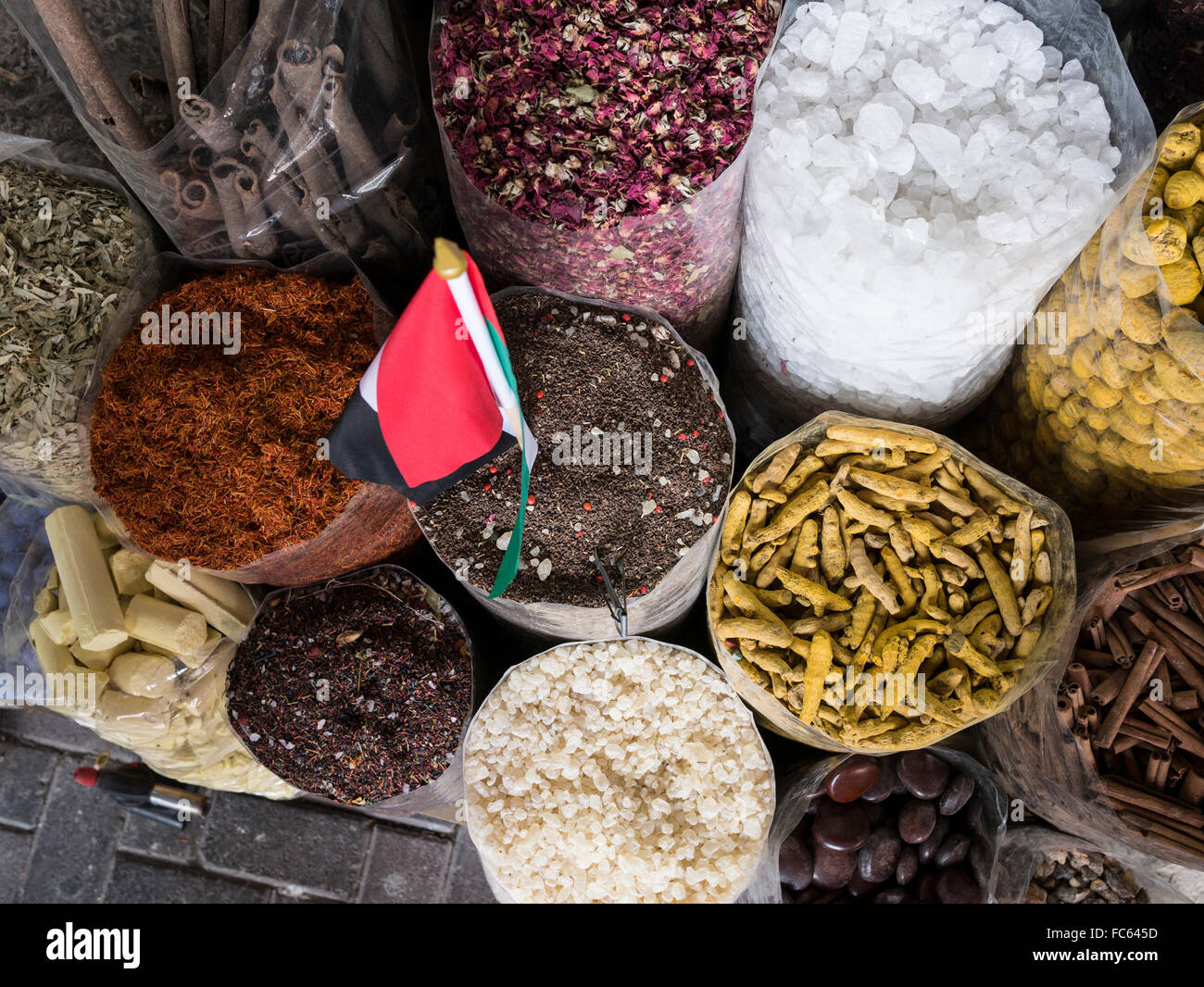 Dubai spice souk window display; herbs, dried fruits, spices, dried ...