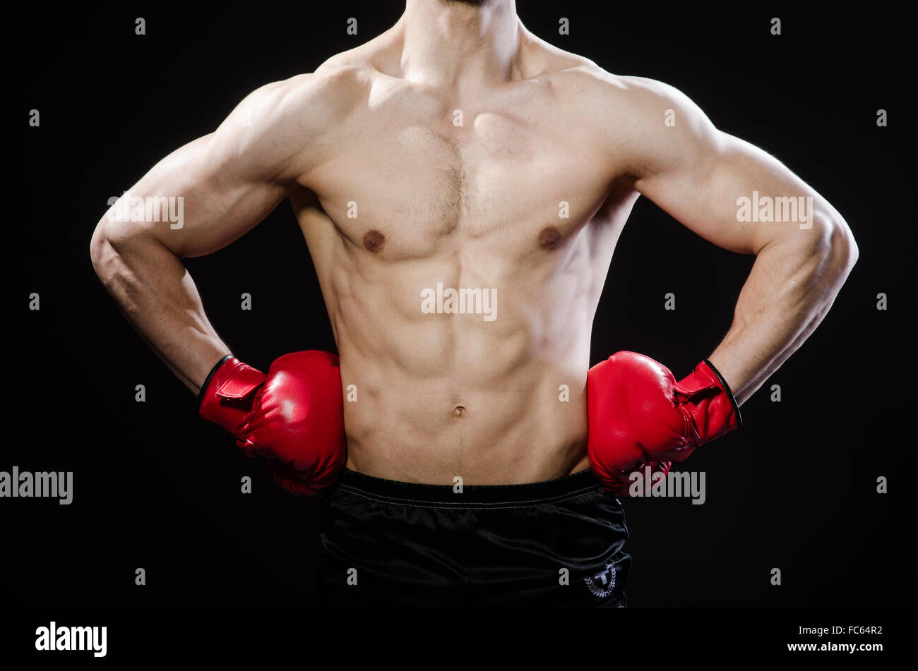 Muscular man in boxing concept Stock Photo - Alamy