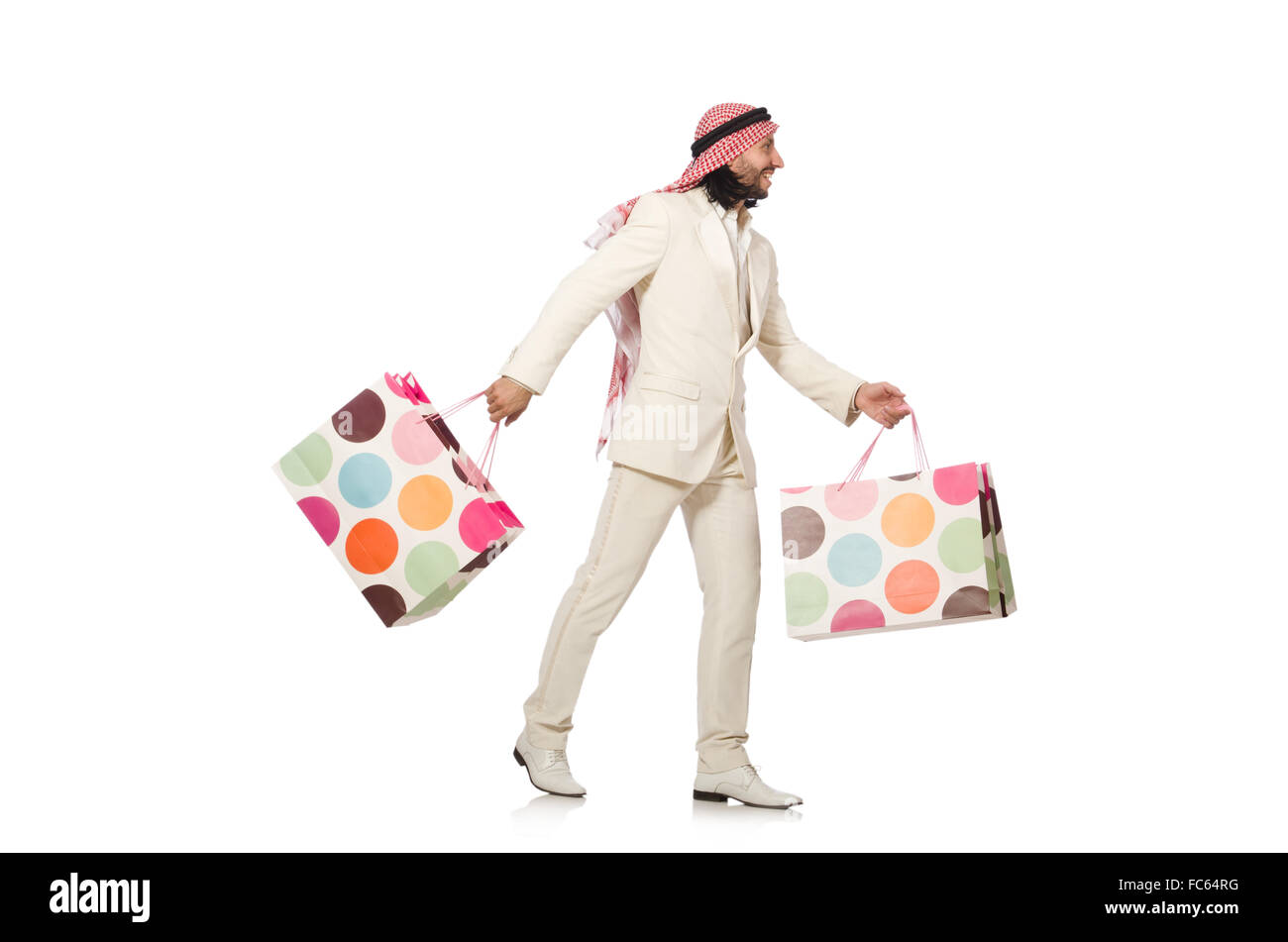 Arab man with shopping bags on white Stock Photo - Alamy