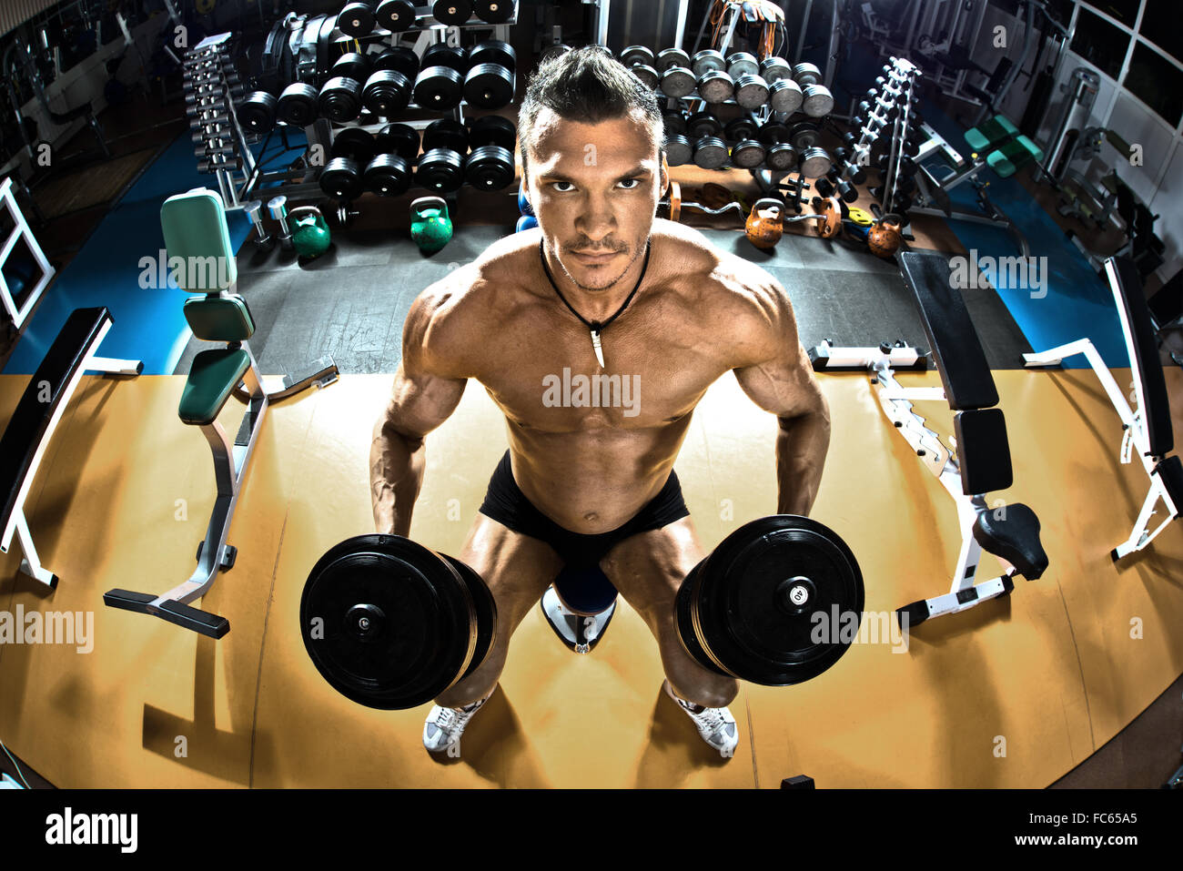 Athletic strong bodybuilder execute exercise hi-res stock photography ...