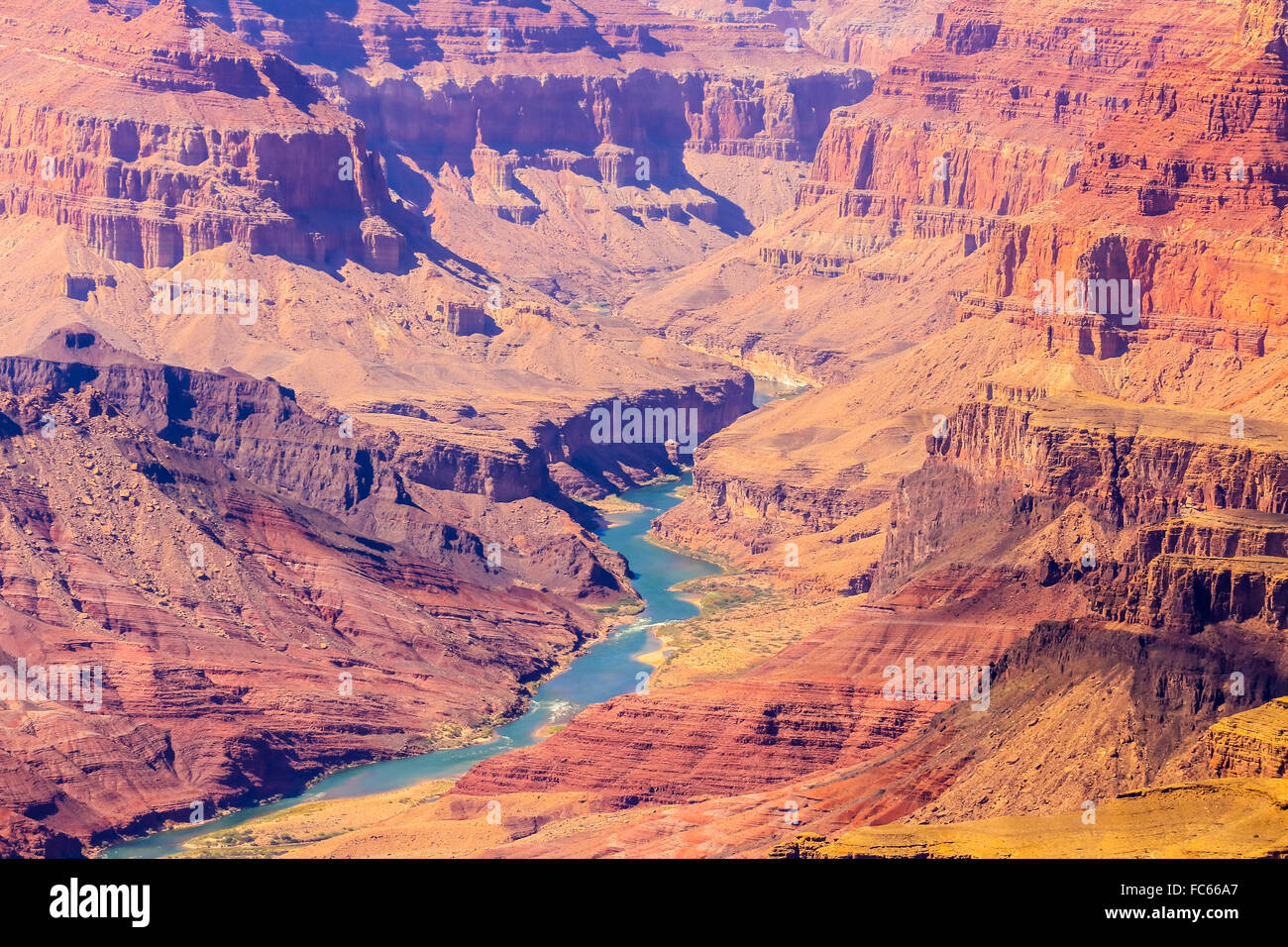 Red rocks and blue water Stock Photo - Alamy
