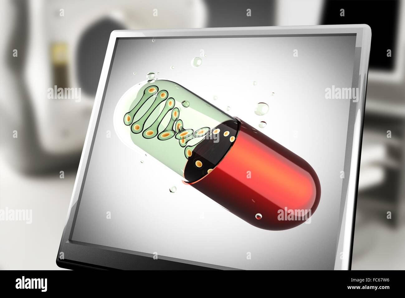 Transparent capsule on monitor in laboratory Stock Photo - Alamy