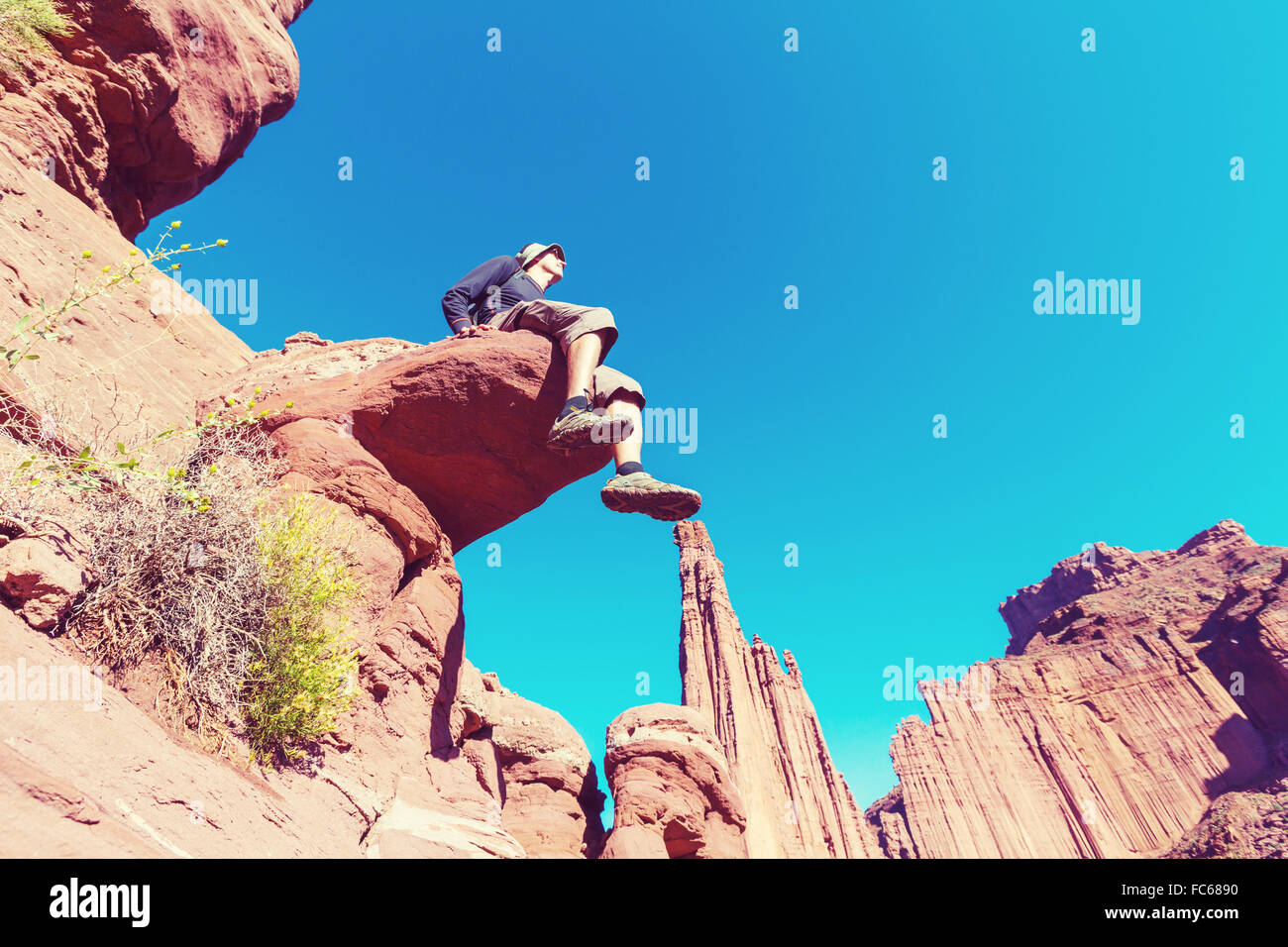 Man on the cliff Stock Photo - Alamy