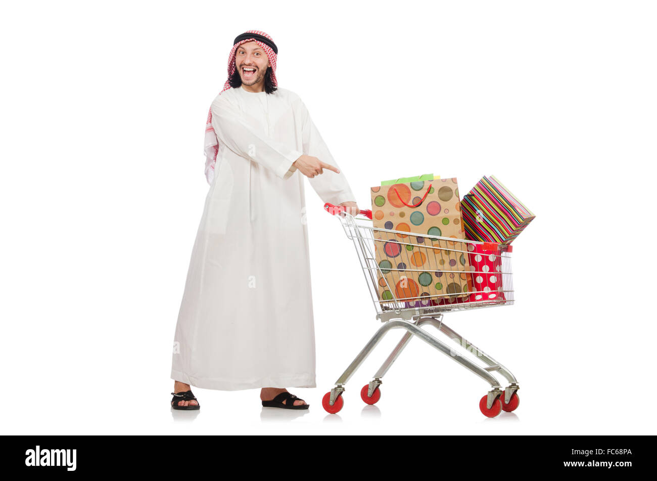 Arab man doing shopping isolated on white Stock Photo - Alamy
