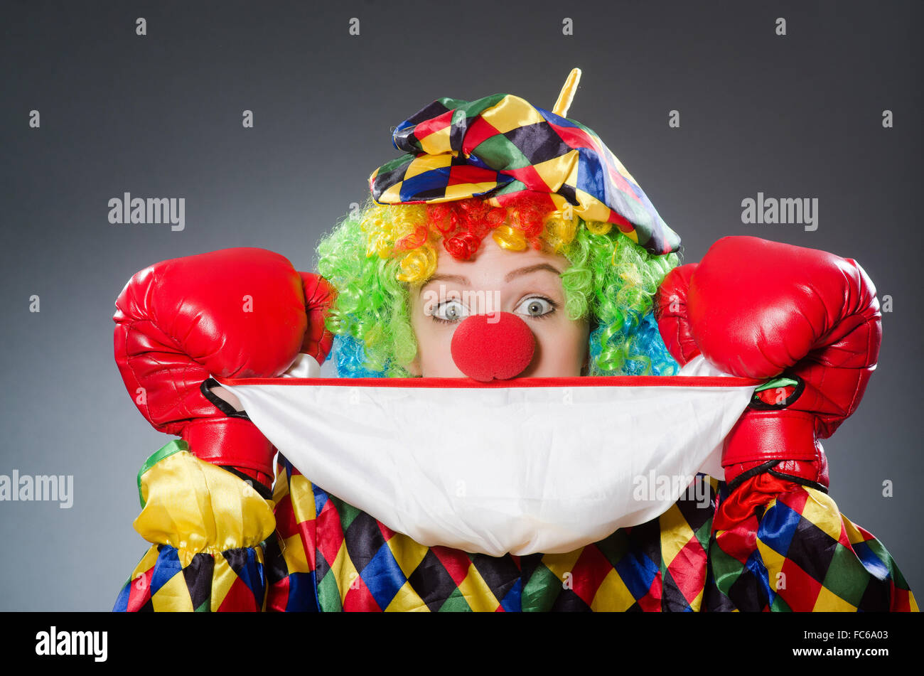 Funny clown with boxing gloves Stock Photo - Alamy