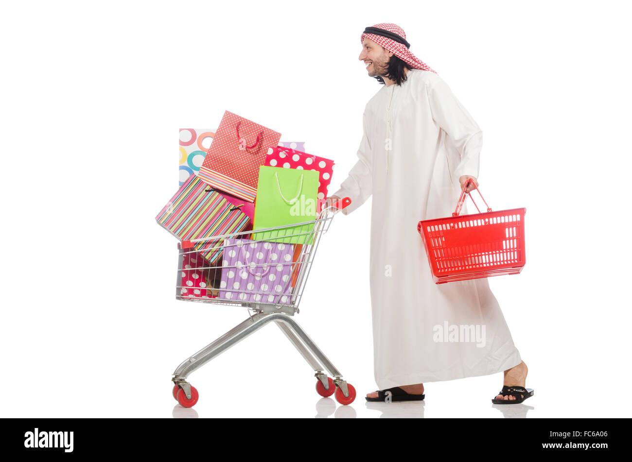 Arab man doing shopping isolated on white Stock Photo - Alamy