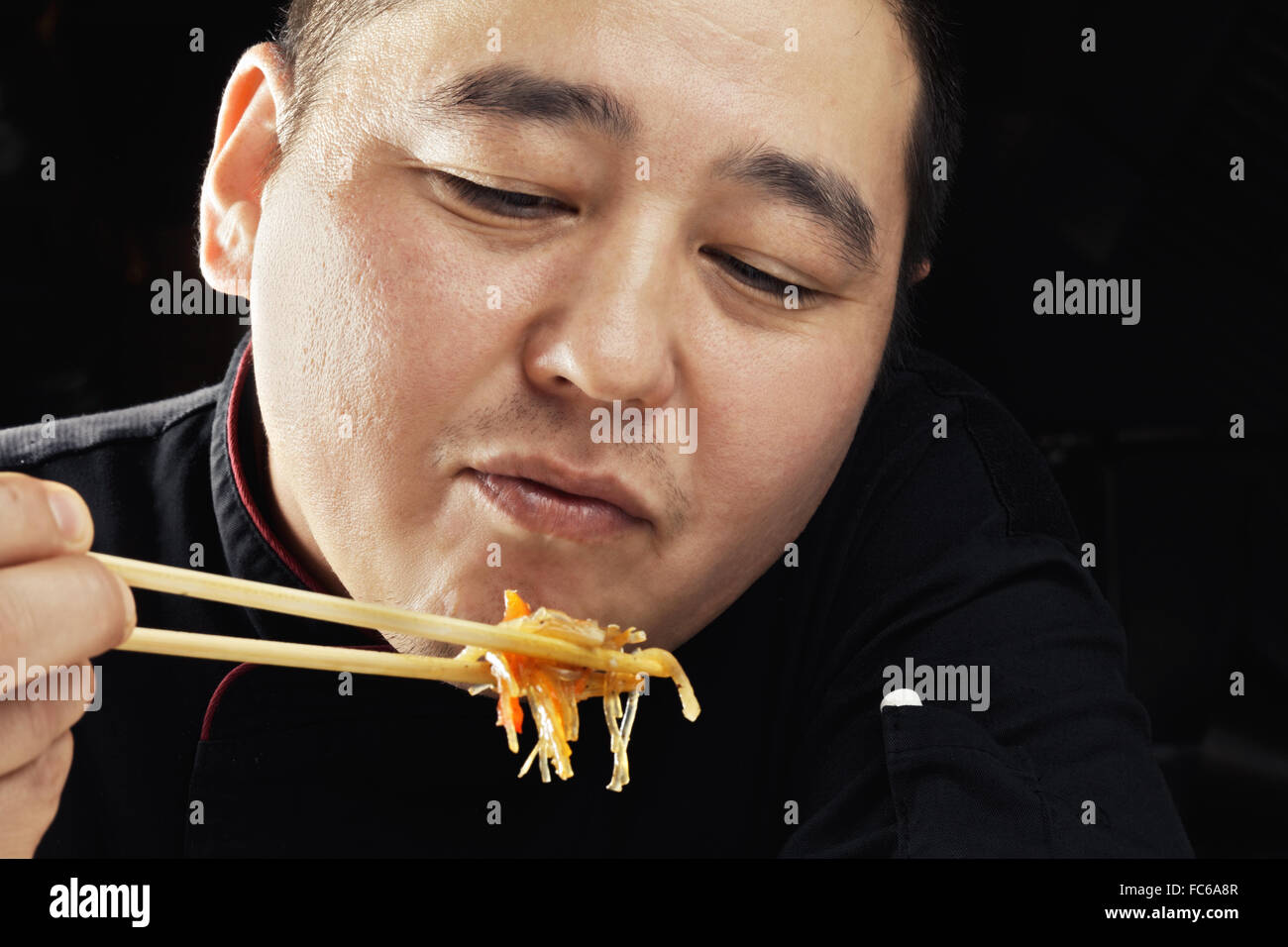 Guy looking at food closeup Stock Photo - Alamy