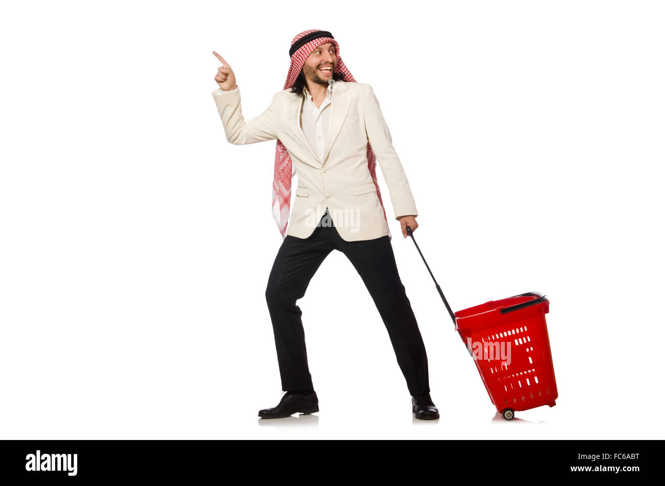 Arab man doing shopping isolated on white Stock Photo - Alamy